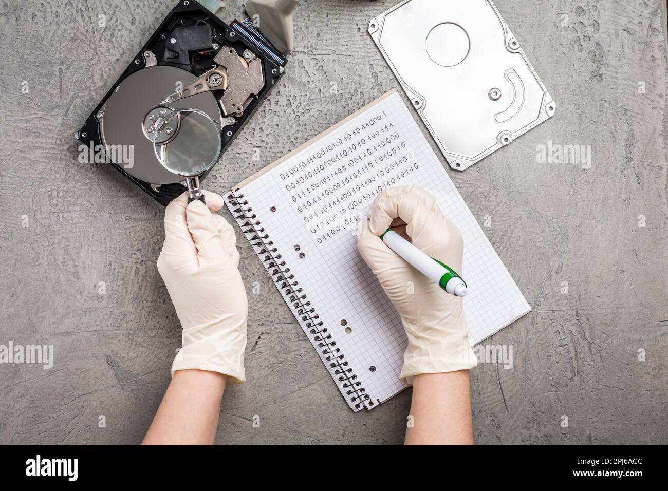 Concept of data recovery, engineer is recovering data from failed hard ... Concept of data recovery, engineer is recovering data from failed hard ...