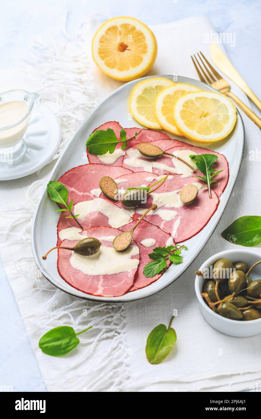 Vitello tonnato - Italian cuisine, sliced veal with tuna sauce as ...