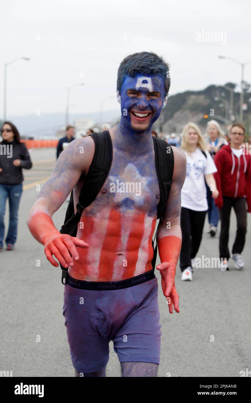 Jordan Jensen of Seattle makes his way toward the Bay to Breakers ...