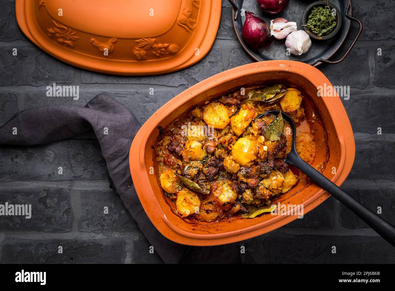 Homemade goulash with potatoes and sauerkraut. Beef and vegetable stew ...