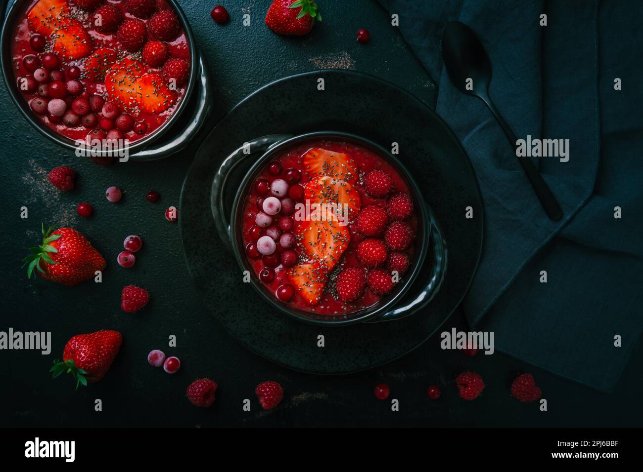 Breakfast red smoothie bowl with chia seeds, strawberry, raspberry and ...