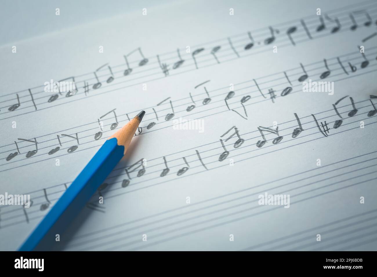 Random music notes with pencil. Music and compose concept Stock Photo ...