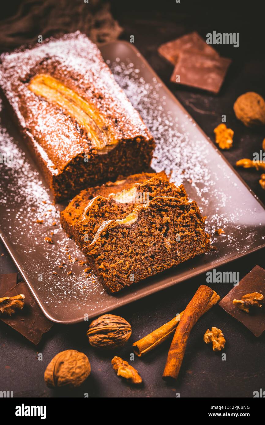 Homemade vegan banana bread or cake with nuts, chocolate and cinnamon ...