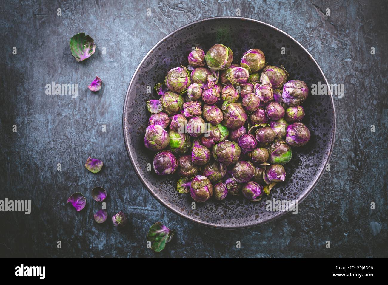 Organic Fresh Purple Brussels sprouts in bowl Stock Photo - Alamy