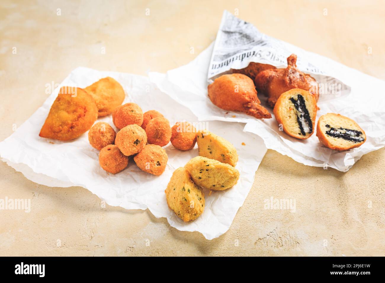 Finger food and street food - assortment of Arancini rice balls, fried ...