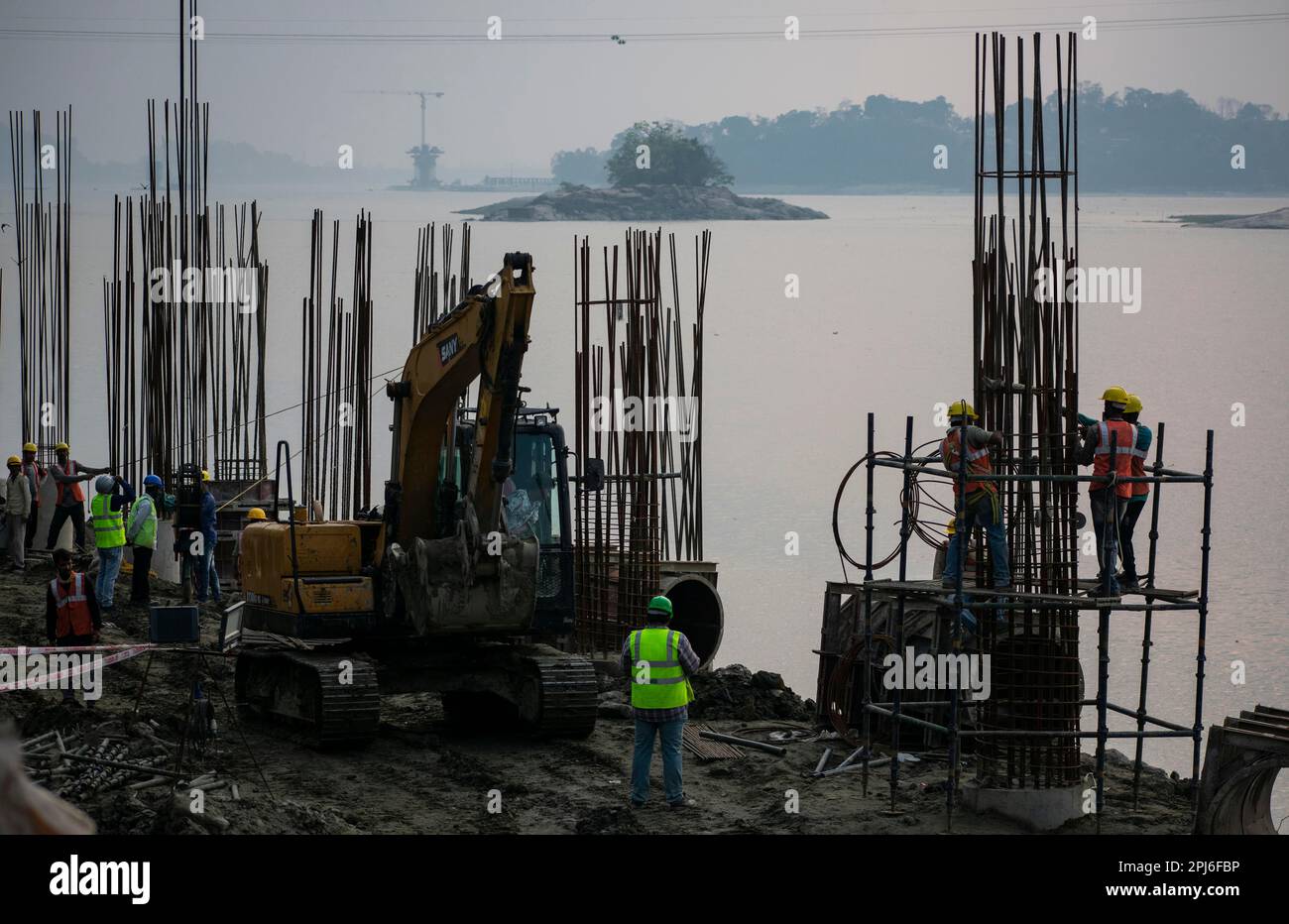 Guwahati, India. 27 March 2023. Construction workers busy making ...