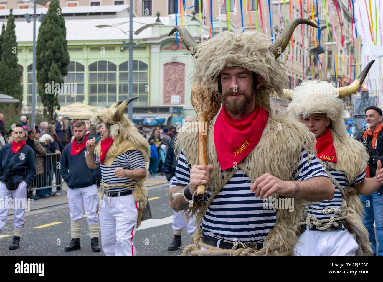 Traditional bell ringer masks in sailors mother, sheepskin and cap with ...
