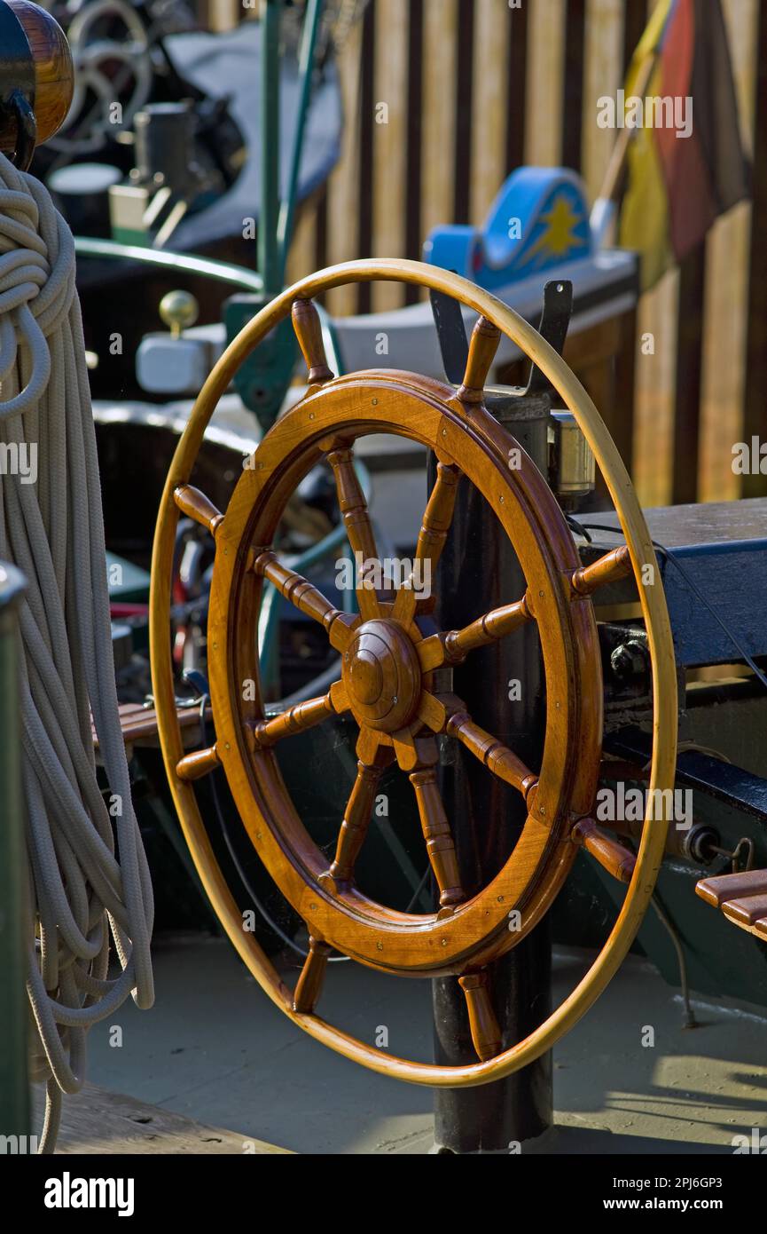Wooden steering wheel of a flat-bottomed ship, Carolinensiel, East ...