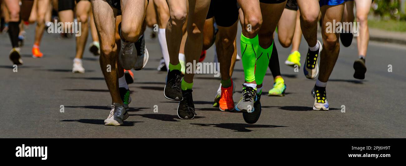 Street marathon runners legs hi-res stock photography and images - Alamy