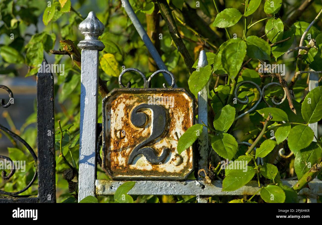House number 2 on an old fence Stock Photo - Alamy