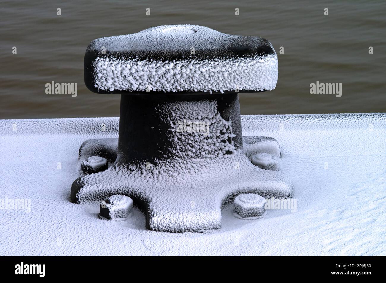 Bollards and snow Stock Photo - Alamy