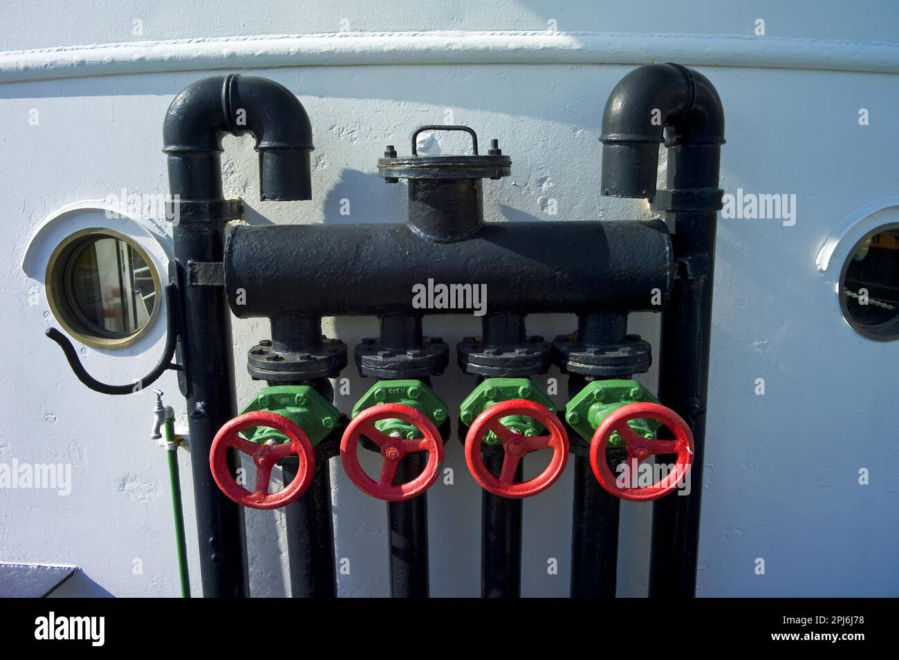 Valves and handwheels on board a ship Stock Photo - Alamy