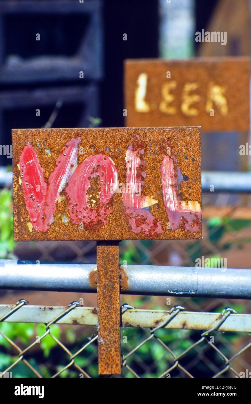 Lettering Full on a Blecjtafel, industrial site Stock Photo - Alamy