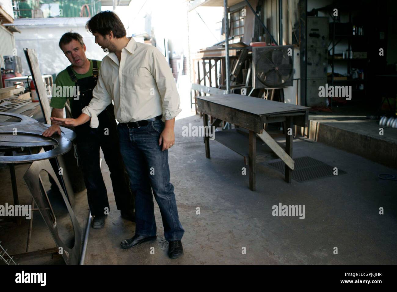 designspotting17 043.ls.jpg From right: Architect Brett Terpeluk and ...