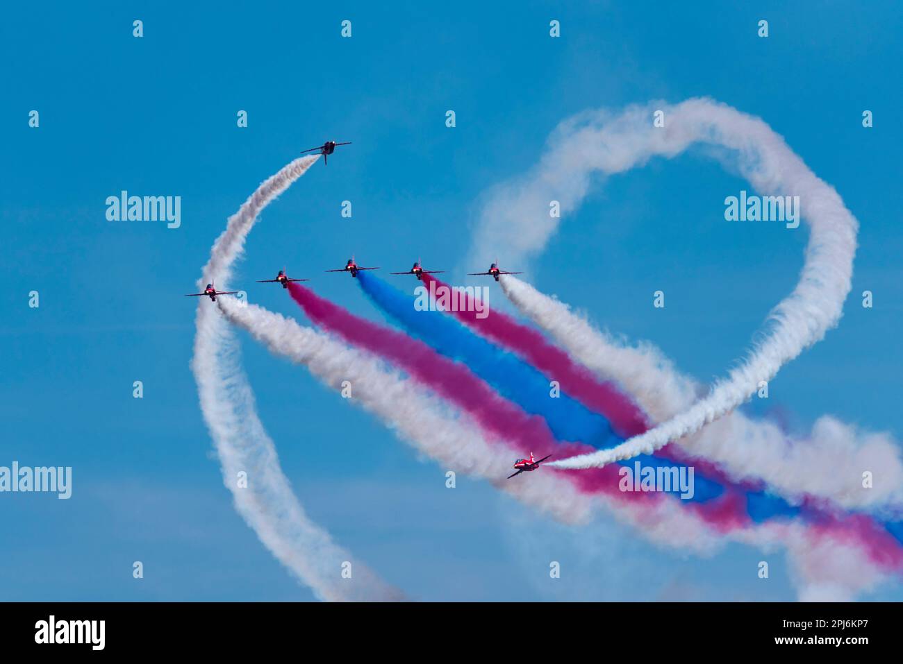 Royal Air Force Red Arrows display team flying at the Royal International Air Tattoo airshow at ...