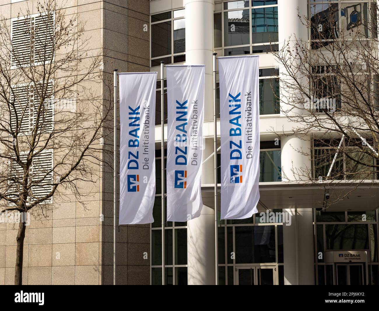 DZ Bank flags in front of the headquarters building. Logo of the big ...