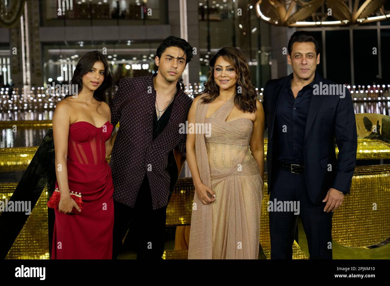 Bollywood actor Salman Khan, right, stands for photographs with Gauri ...