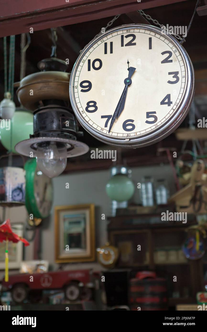 Vintage clock. Various vintage objects for sale at a indoor flea market ...