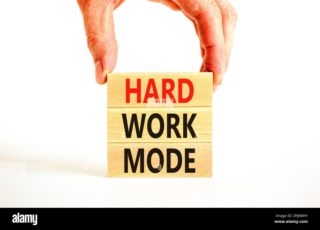 Hard work mode symbol. Concept words Hard work mode on wooden block on ...