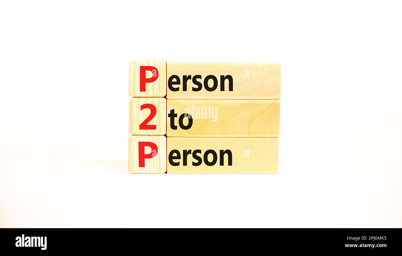 P2P person to person symbol. Concept words P2P person to person on wooden blocks on a beautiful ...