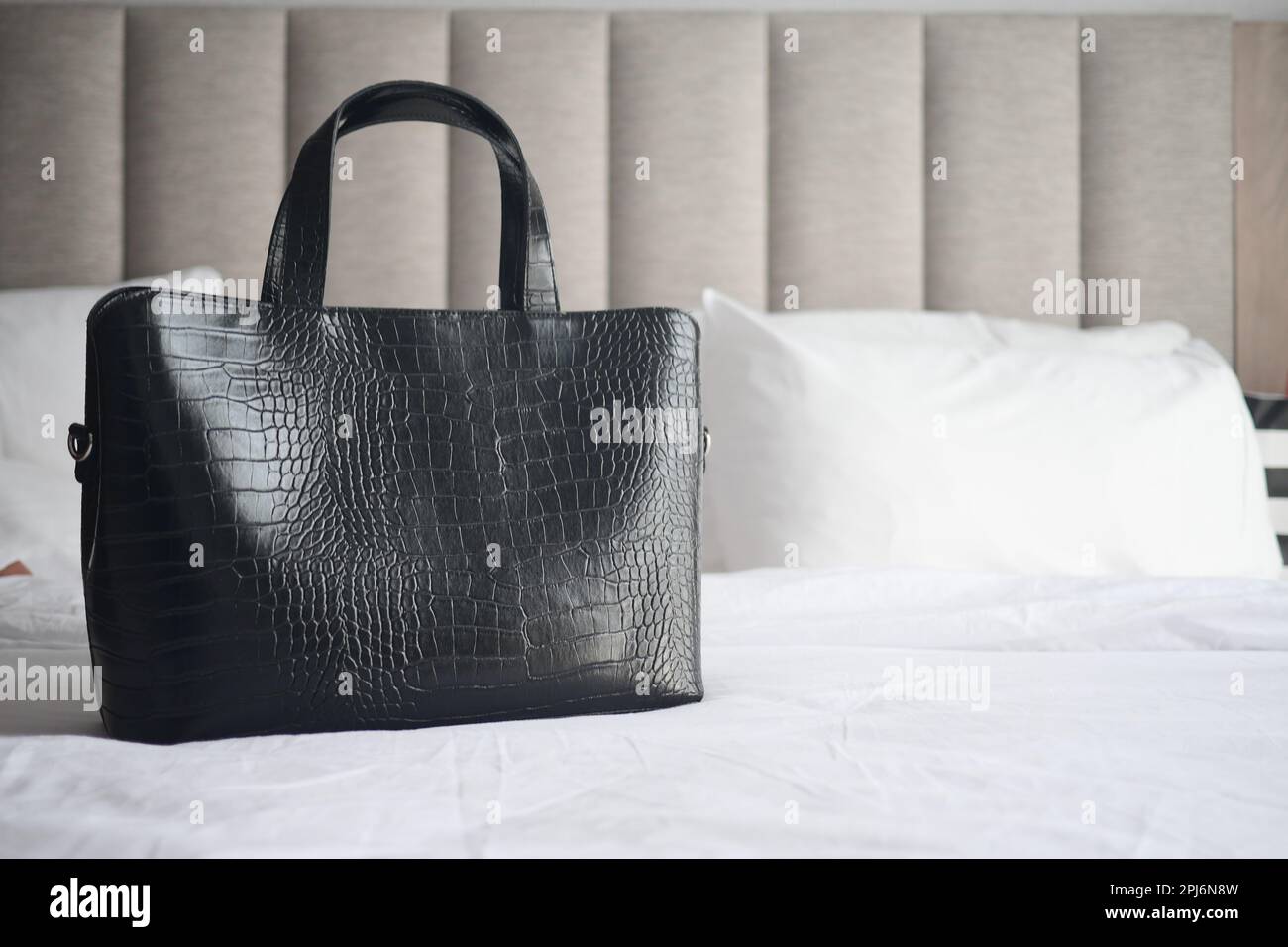 women purse wallet on bed, close up Stock Photo - Alamy