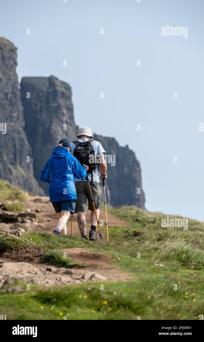 Hikers walking near the Quiraing on the Isle of Skye, Scotland, UK ...