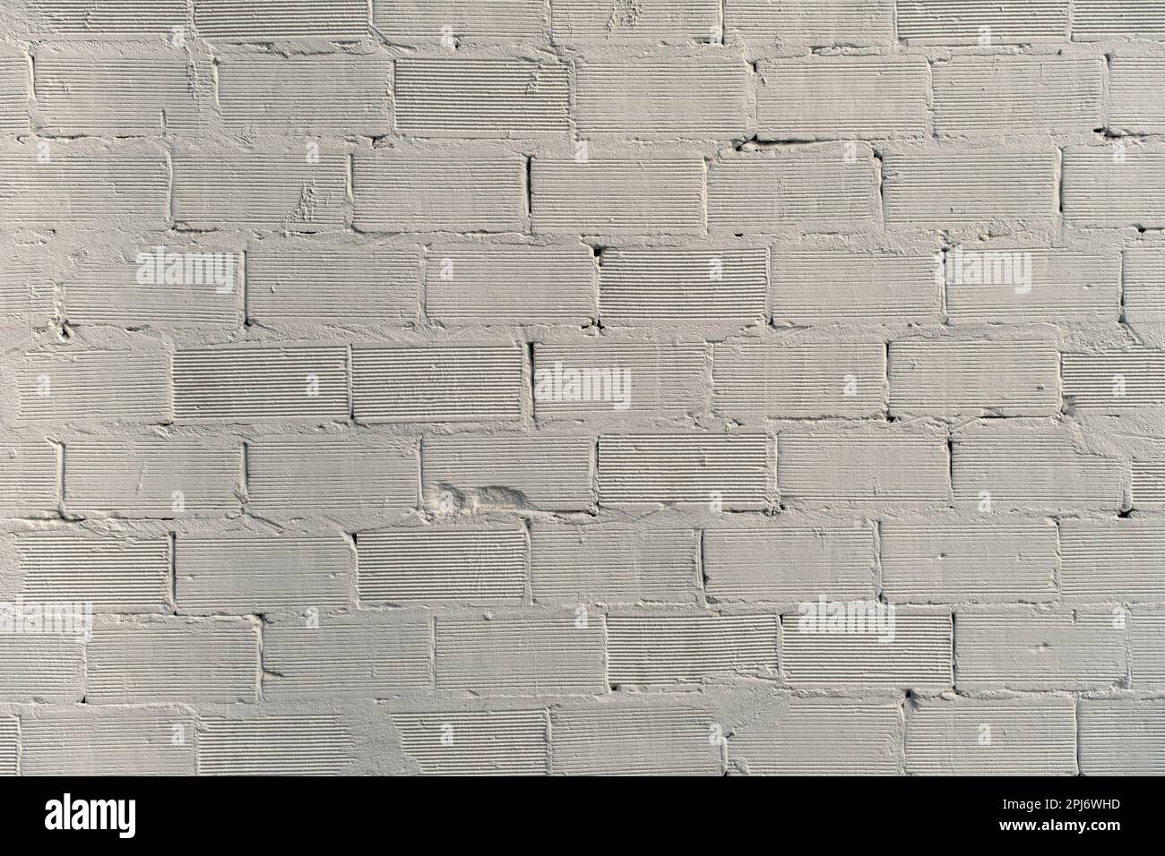 White plaster coating on bricks wall, grunge background Stock Photo - Alamy