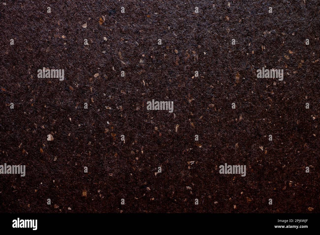 Dark brown colored artisan paper, luxury paper with natural fibres ...