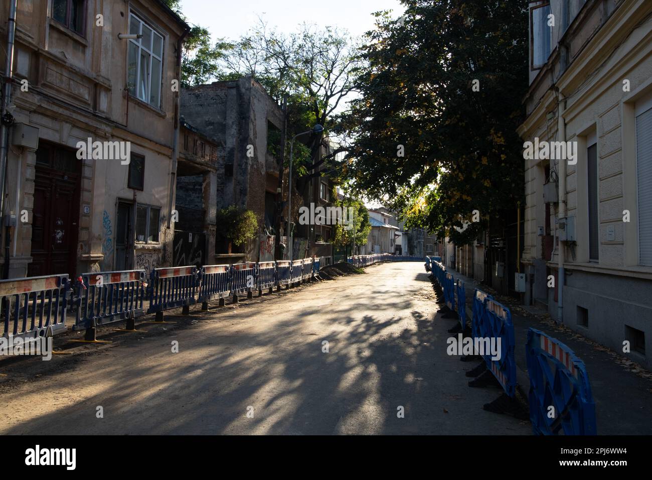 Construction workers at construction site and heavy duty bulldozer in ...