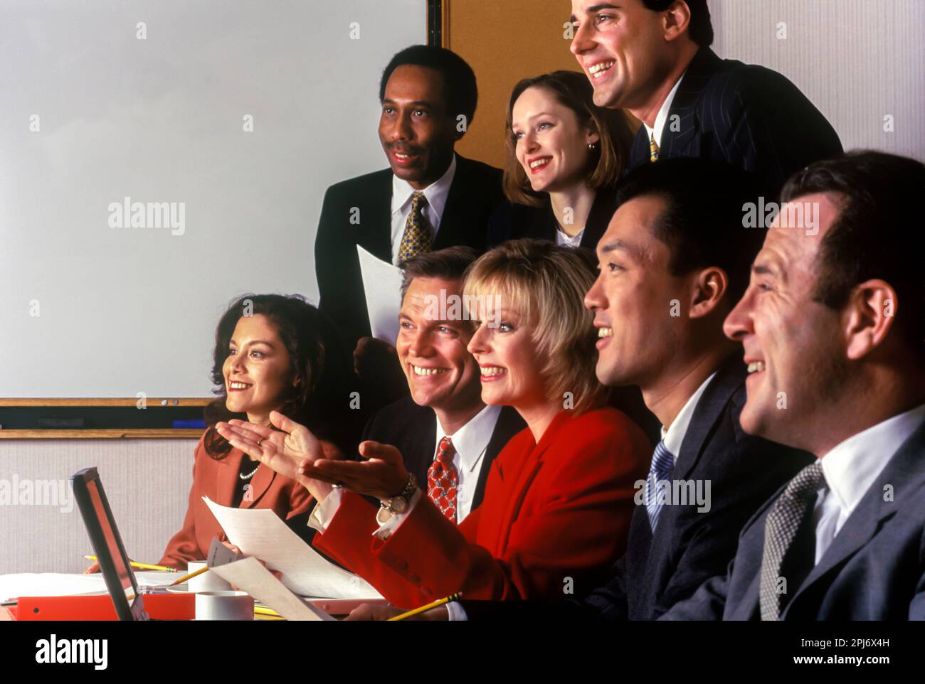 Businessmen sitting around table hi-res stock photography and images ...