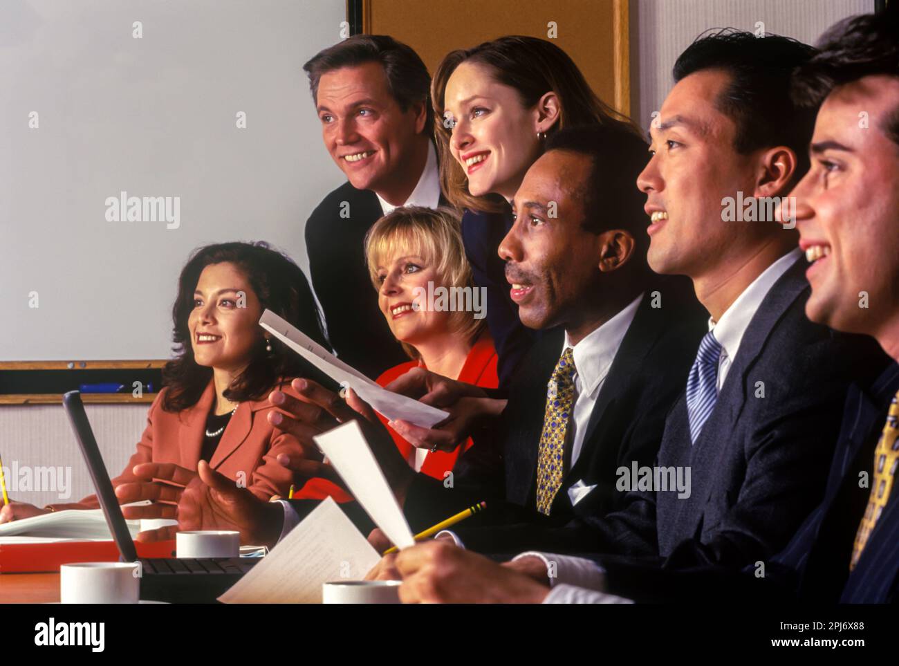 Businessmen sitting around table hi-res stock photography and images ...