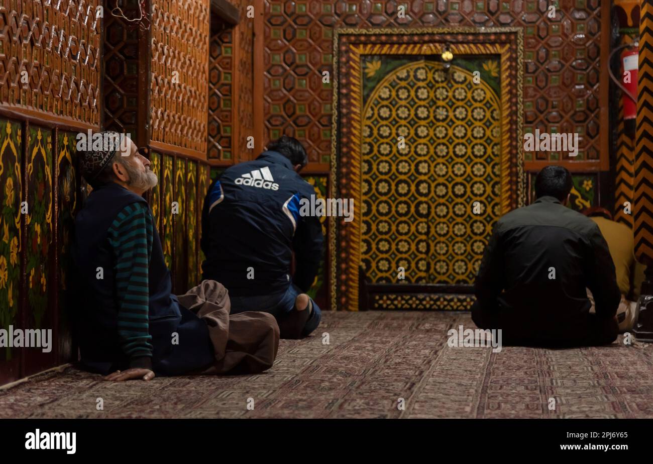 A Kashmiri Muslim man listens to the head Priest reciting sermon of ...