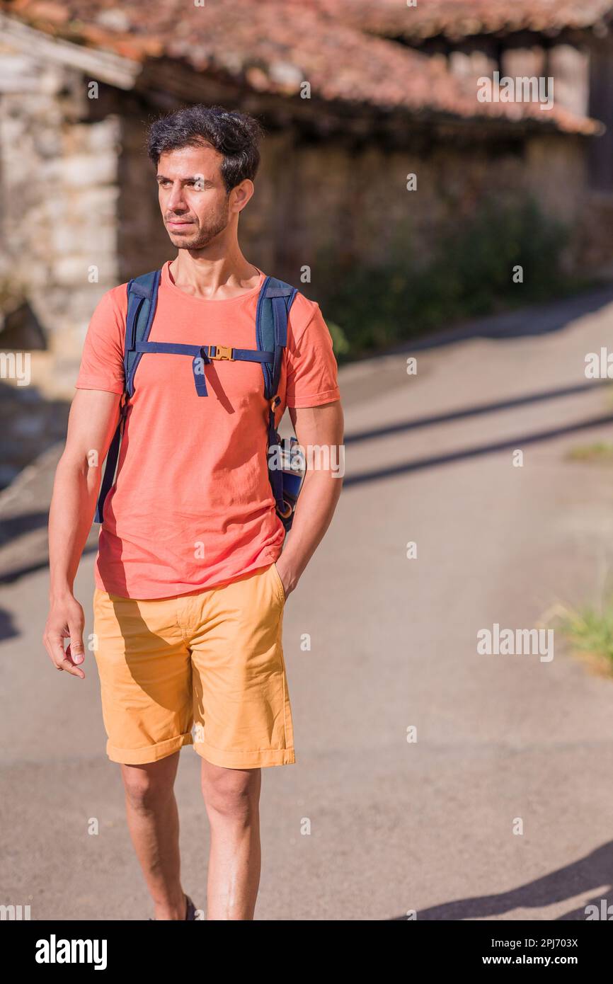 Indian mid man in Asturias summer vacation. Casual hiker adventure with ...