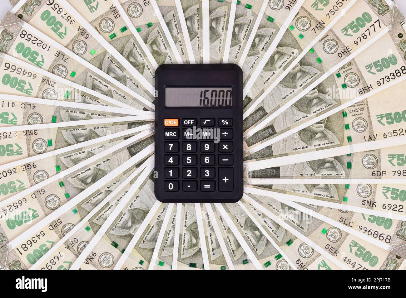 Top view of calculator with indian currency note, budget concept Stock ...