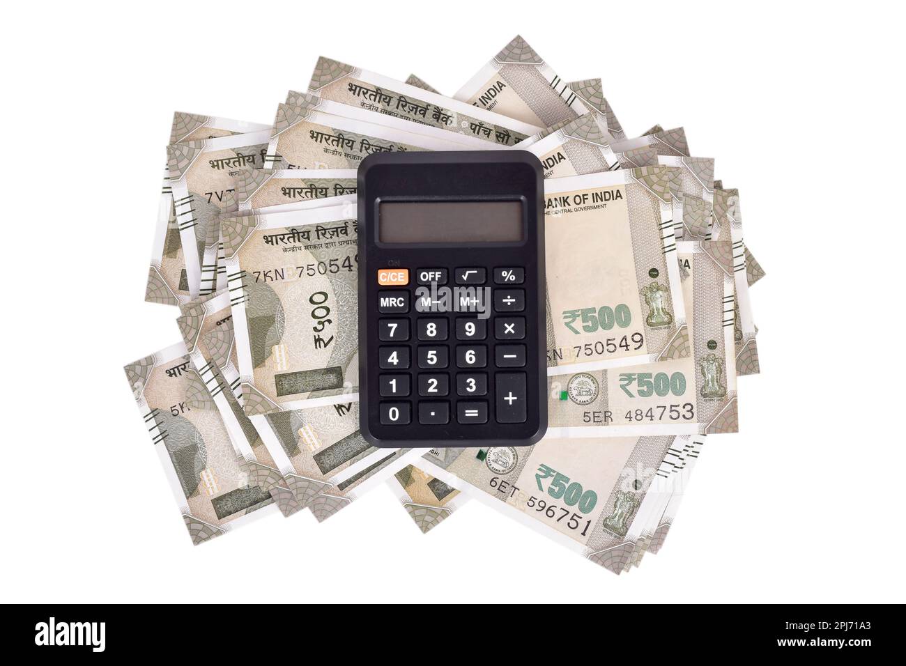 Top view of indian currency note with calculator isolated on white ...