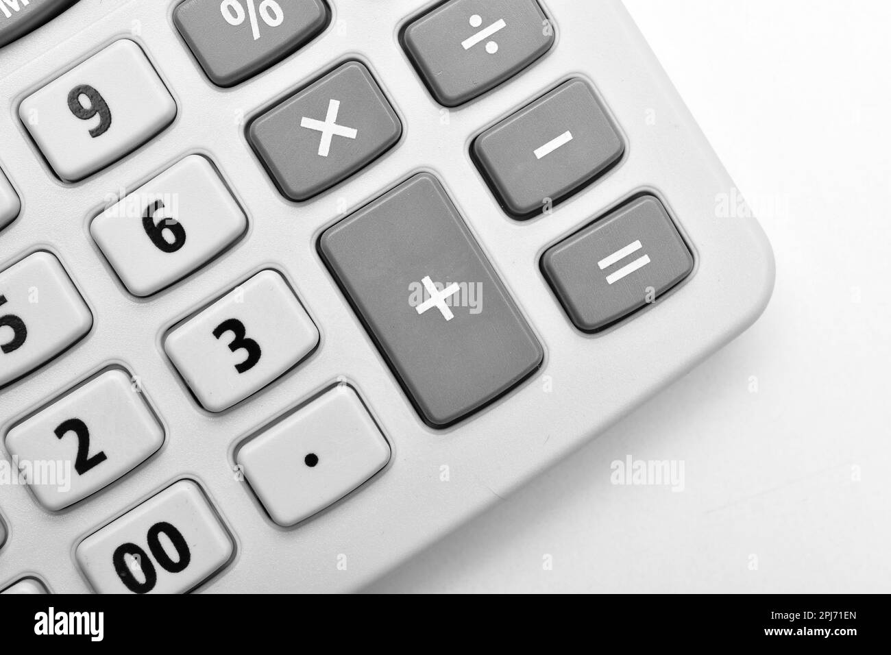 Calculator isolated on white background Stock Photo - Alamy