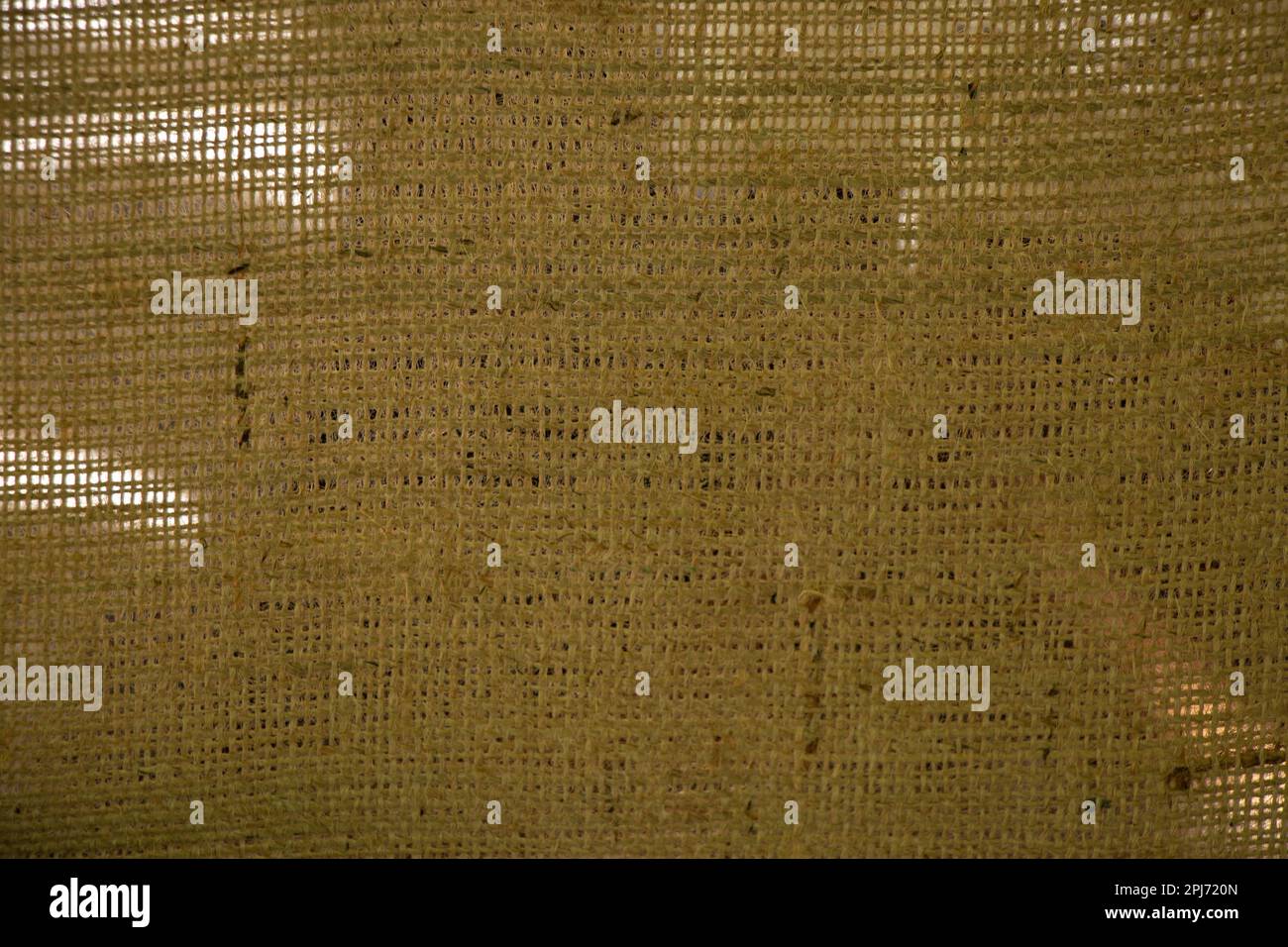 light beige burlap background in daylight close up Stock Photo - Alamy