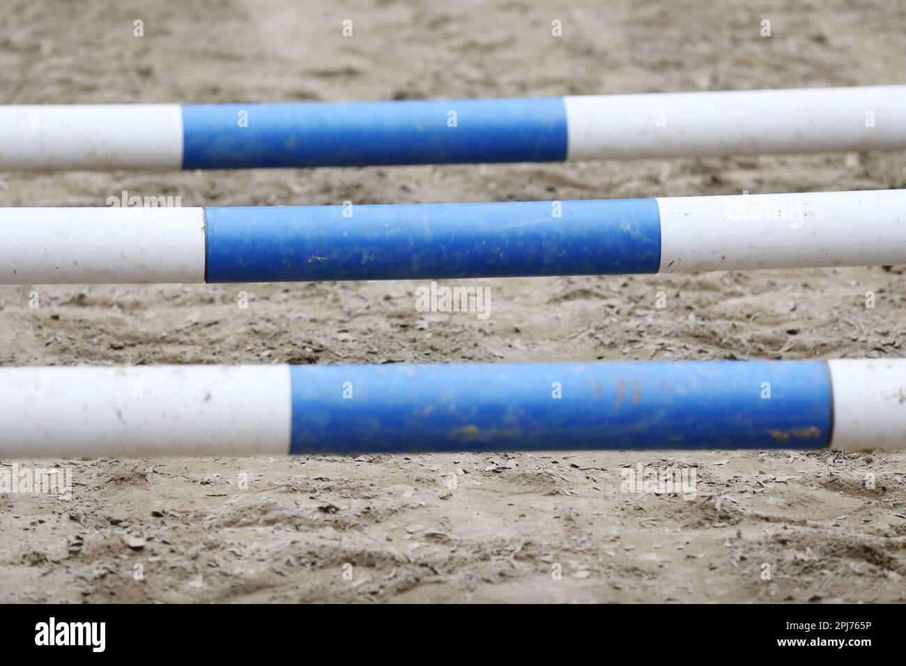 Show jumping poles obstacles, barriers, waiting for riders on show ...