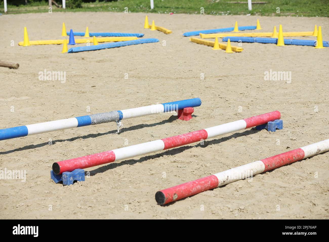 Show jumping poles obstacles, barriers, waiting for riders on show ...