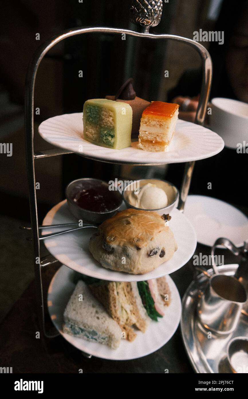An afternoon tea set with a selection of delectable sandwiches and ...