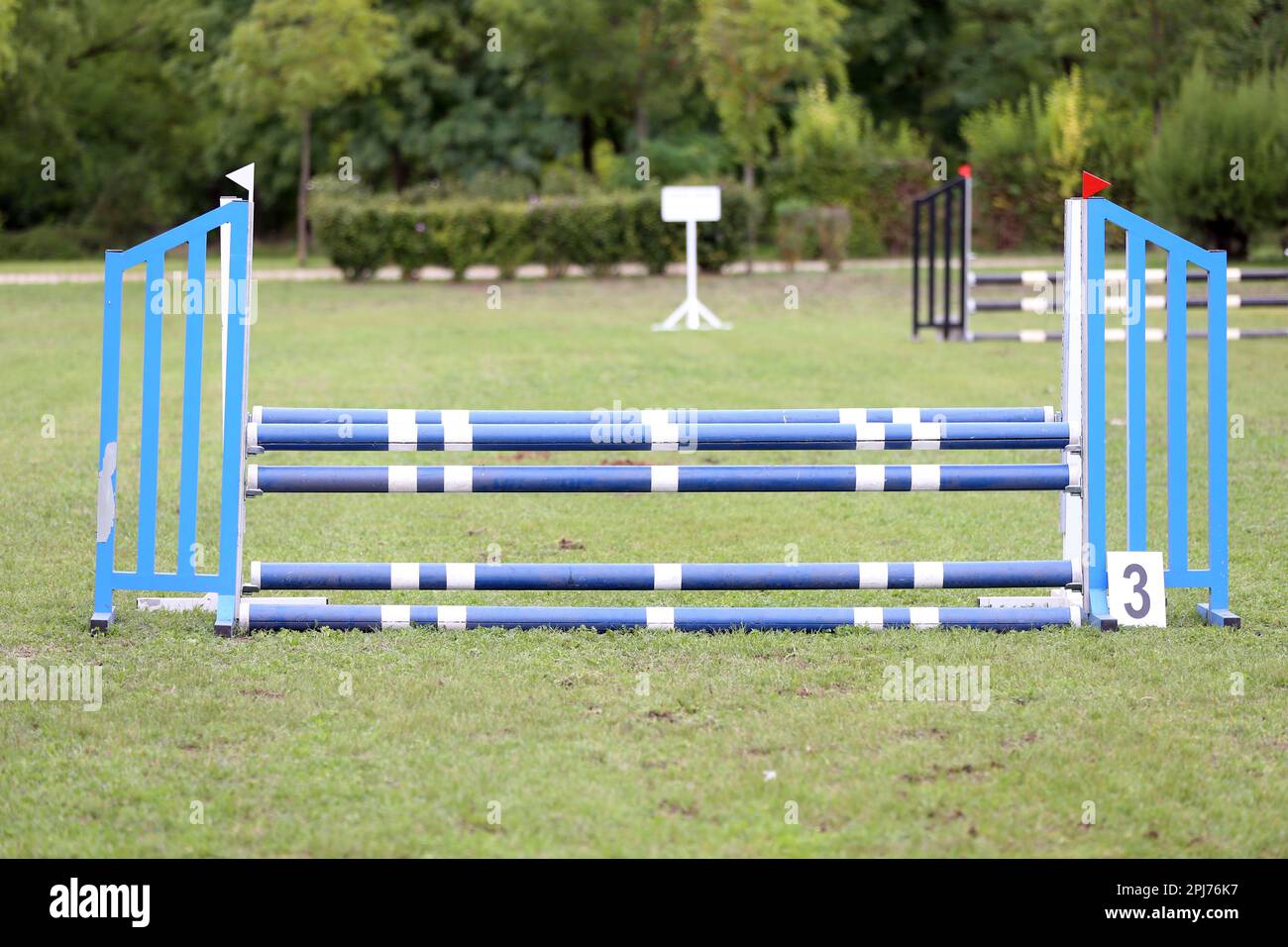 Show jumping poles obstacles, barriers, waiting for riders on show ...