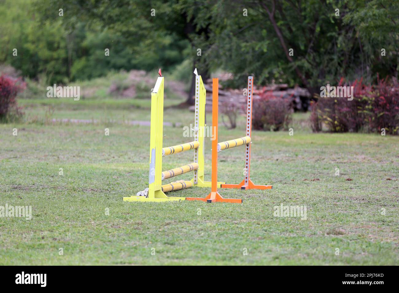 Show jumping poles obstacles, barriers, waiting for riders on show ...