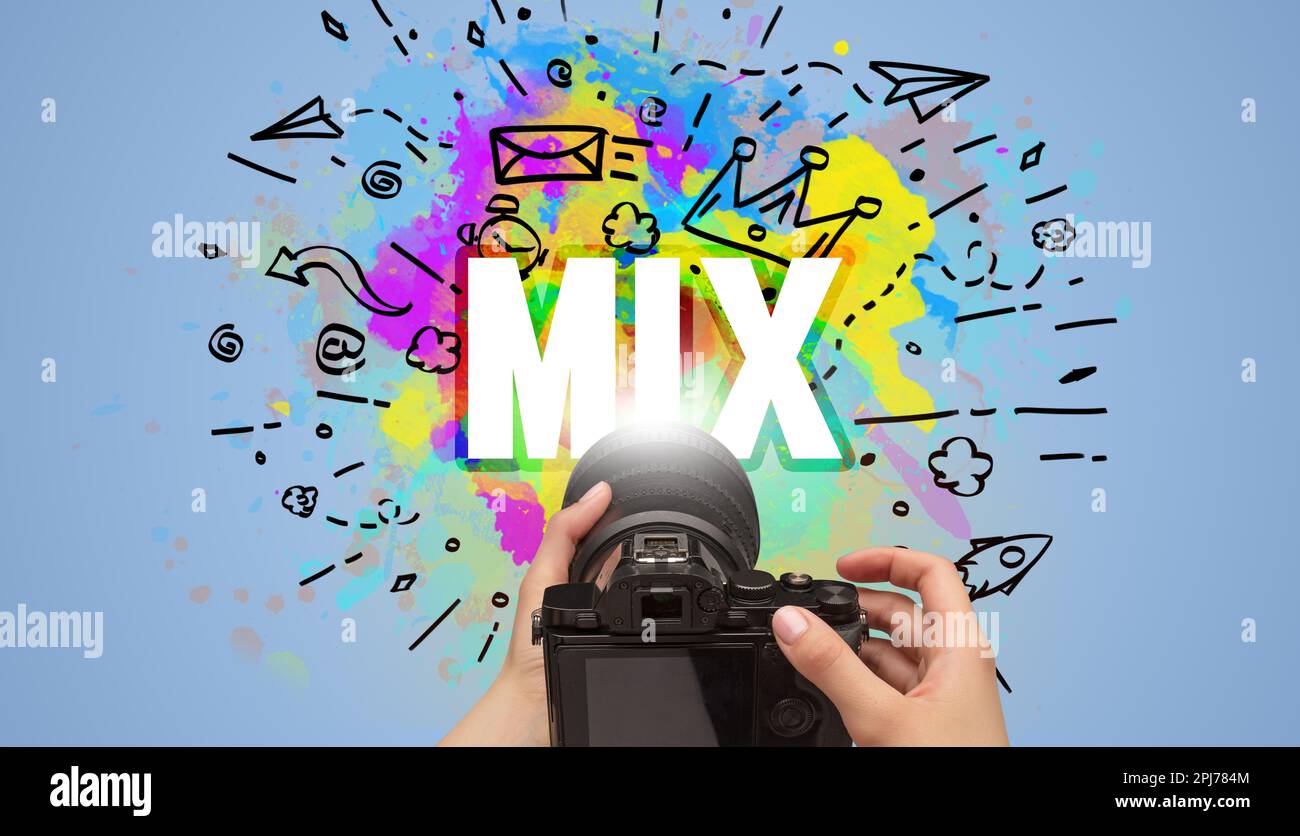 Close-up of a hand holding digital camera with abstract drawing Stock ...