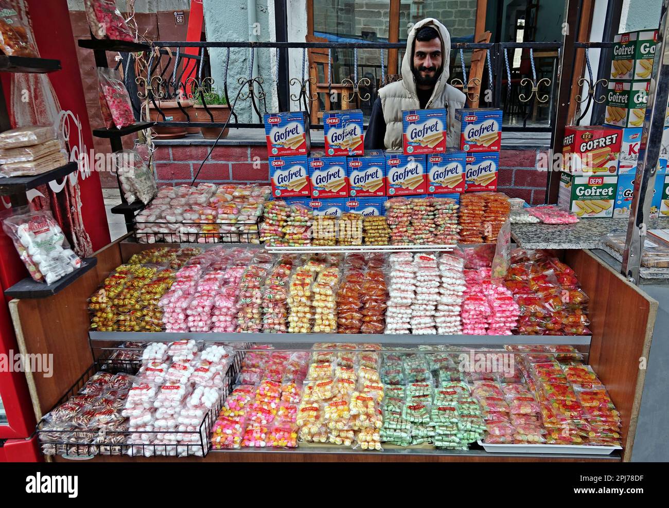 After religious worship and rituals, colored candies are distributed to ...