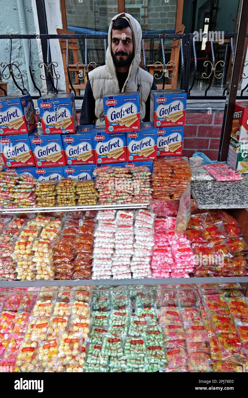 After religious worship and rituals, colored candies are distributed to ...