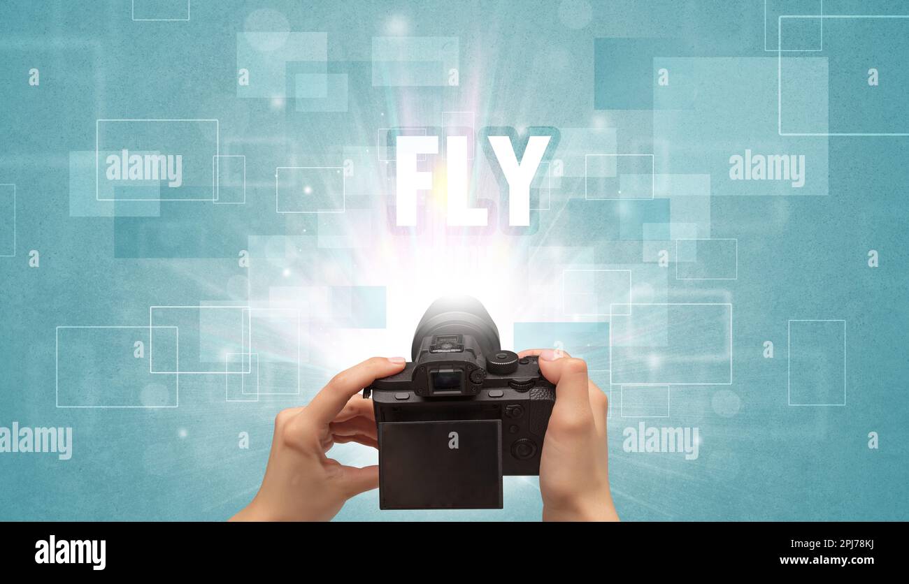 hand holding digital camera, traveling concept Stock Photo - Alamy