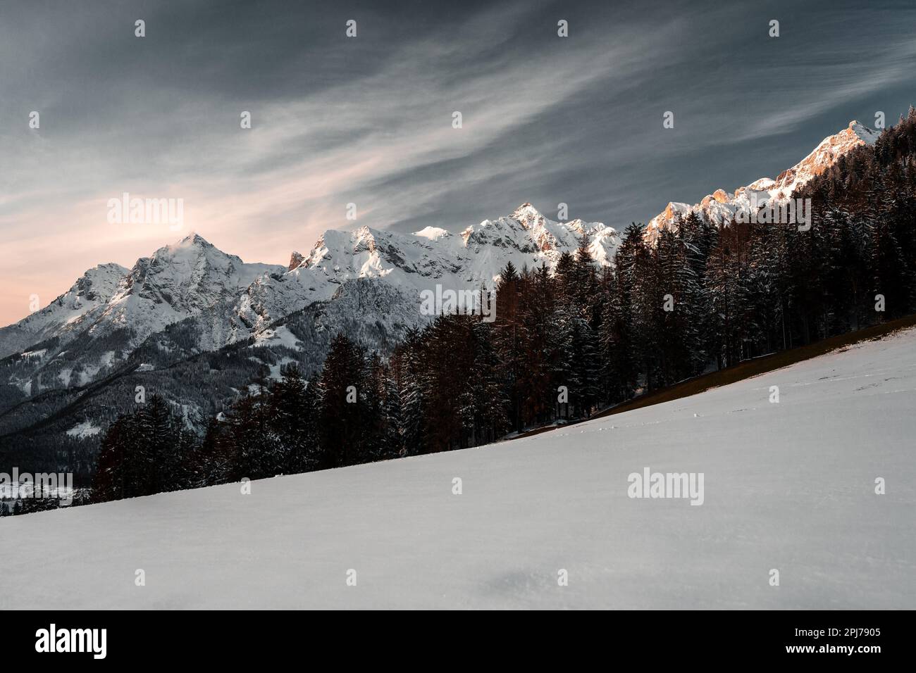 The new snow in austria covered the mountains in a layer of white ...