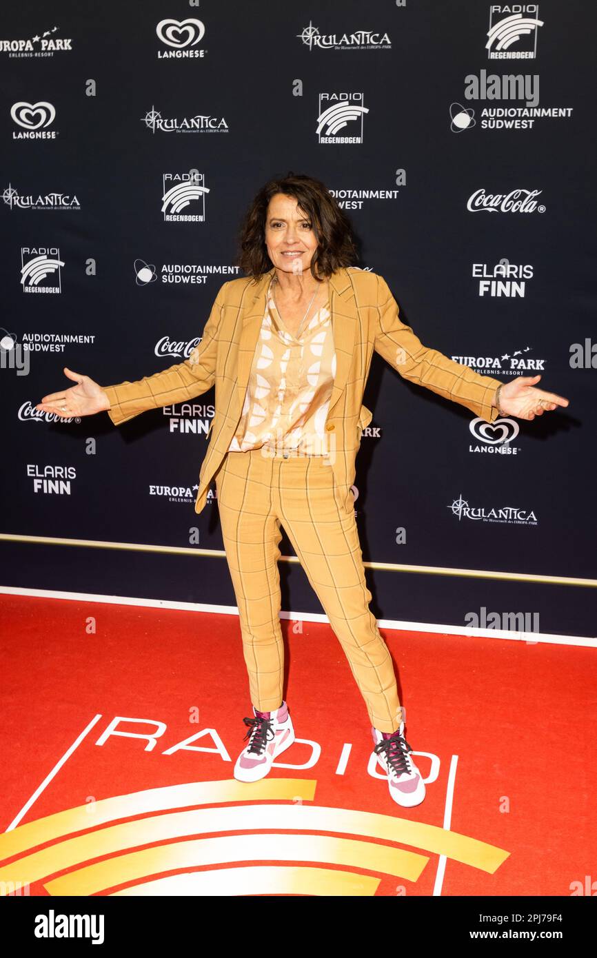 Rust, Germany. 31st Mar, 2023. Ulrike Folkerts stands on the red carpet ...