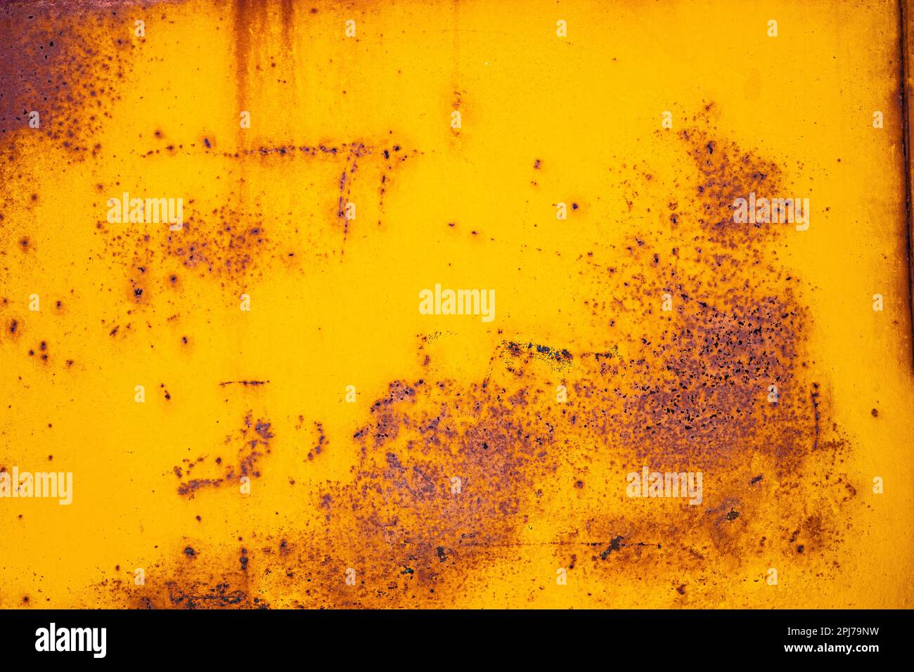 Rust on yellow paint form an intriguing abstract pattern Stock Photo ...