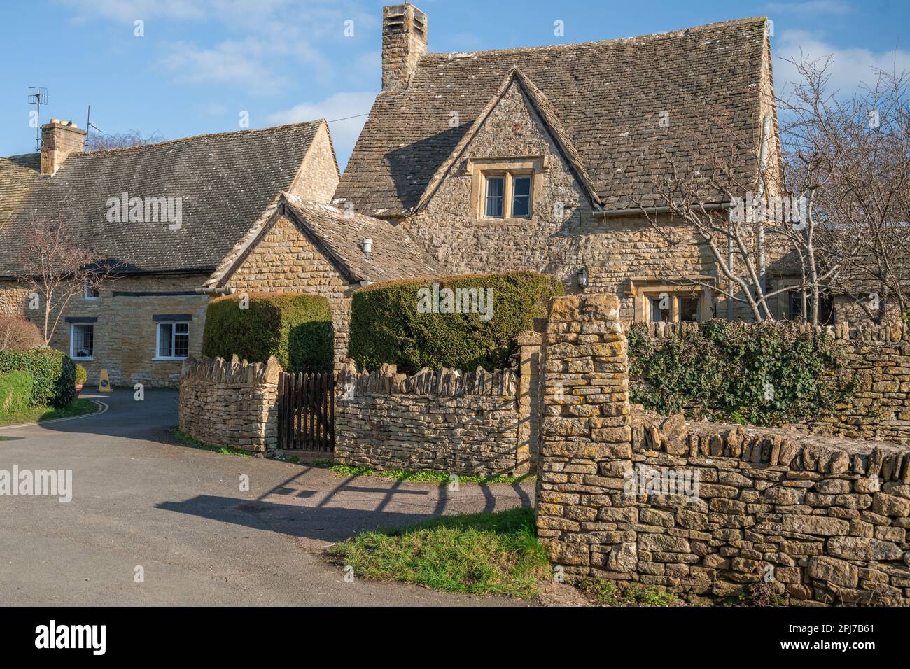 Iconic medieval built houses in Lower Slaughter in Cotswolds England ...